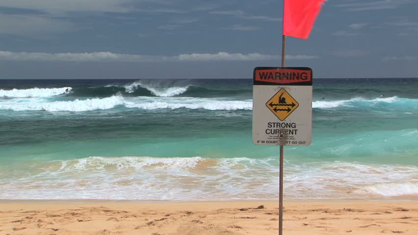 Warning Strong Current And No Swimming Sign In Front Of The Waves At ...