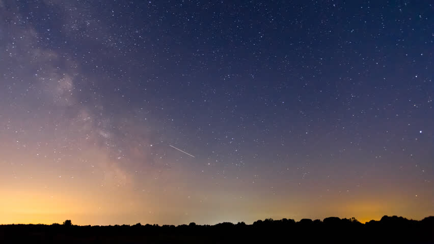 Stars Tracking Across The Night Sky Until Dawn (time Lapse) With Wispy ...