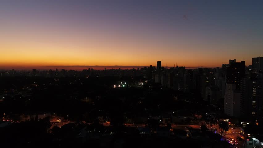 Dusk Skyline with skyscrapers and orange Skies in Sao Paulo, Brazil ...