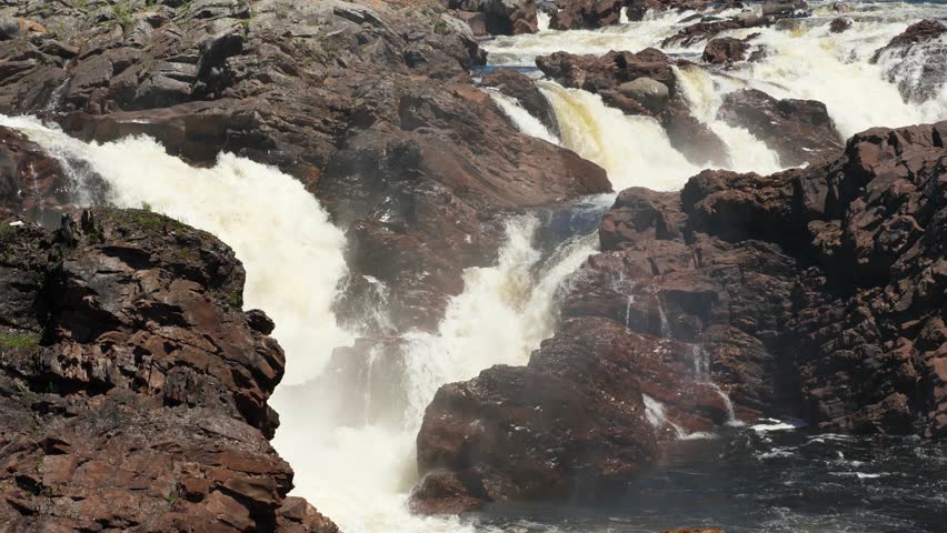 A Gorgeous Rocky Waterfall And Rapids On A Beautiful River At Grand ...
