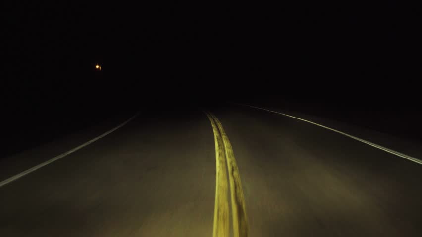 Driving Down Rural Highway In Pitch Black Night Timelapse Loop. Running ...