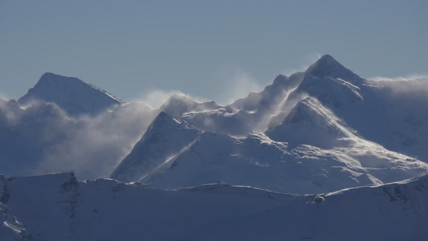 Stock video of wind blows snow from the mountain | 33169282 | Shutterstock