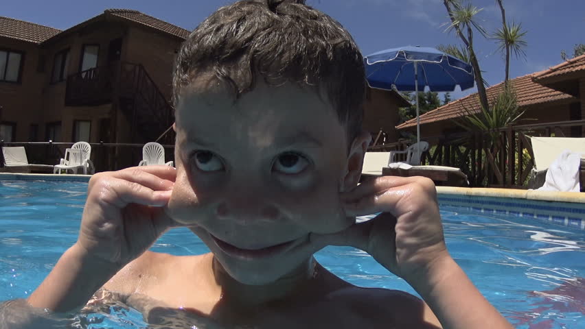 Little Boy Doing Funny Faces, Diving & Playing In Swimming Pool - For ...