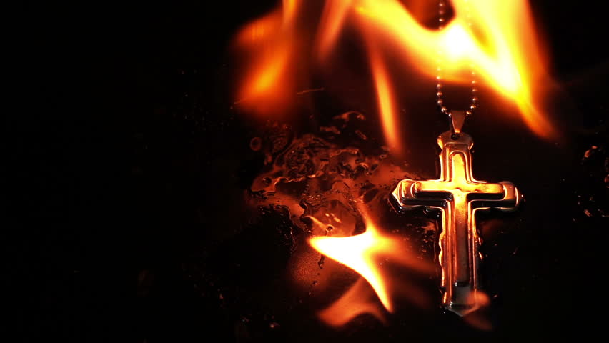 The Shadow Of A Christian Cross In Front Of A Scary Fire. Detail Of A ...