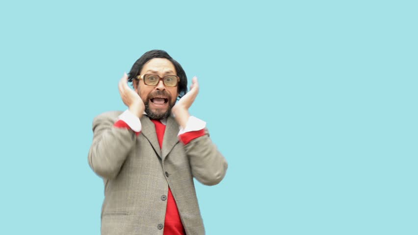 Stock video of an untidy man, wearing glasses, expressing | 3833222 ...