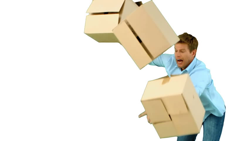 Stock video of clumsy man dropping boxes over on | 4048612 | Shutterstock