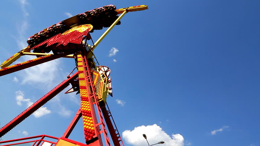 A Fast, High, Spinning Exciting Carnival Ride. Spinning At High Speed ...