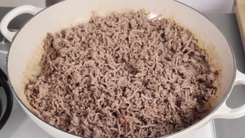 Mixing Browned Minced Meat with Stock Footage Video (100% Royalty-free ...