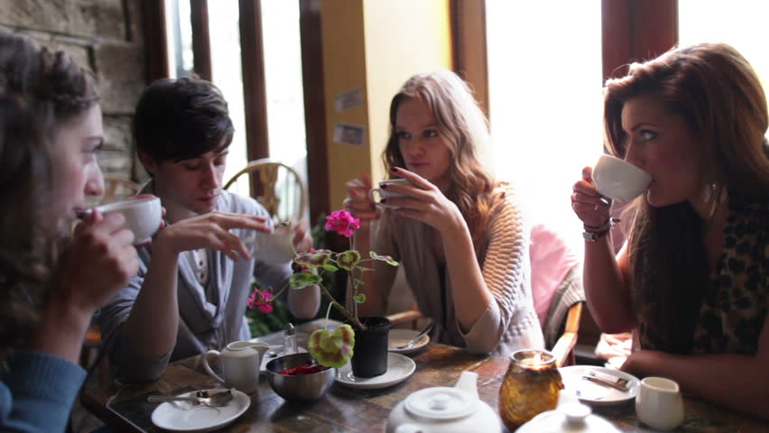 Group Of Multiethnic Women Enjoying Cafe Culture And Relaxing Over Tea ...