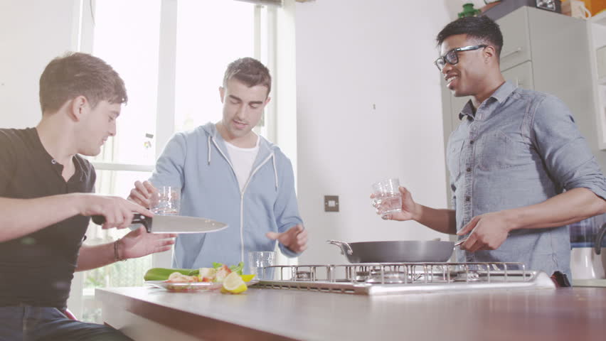 Young People Cooking. Student House Accommodation. Flat Share With ...