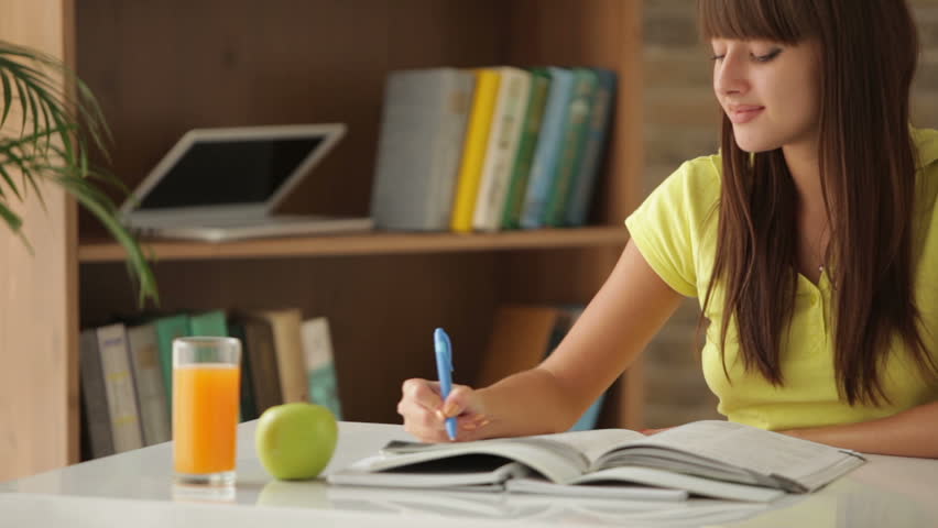 Female Student Sitting At Table And Studying With Laptop Stock Footage ...