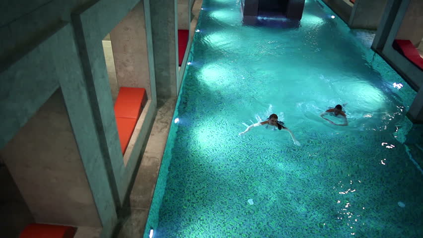 Young Romantic Couple Swimming and Stock Footage Video (100% Royalty ...