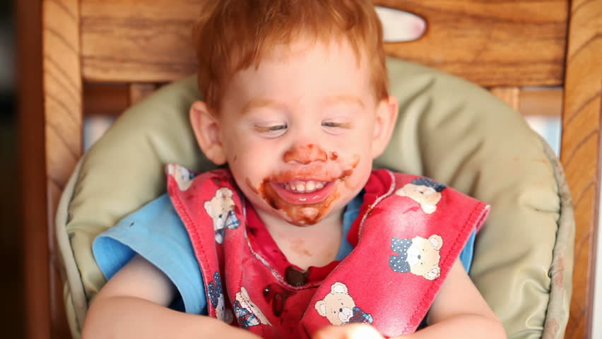 Stock video of baby getting messy eating chocolate pudding | 464722 ...