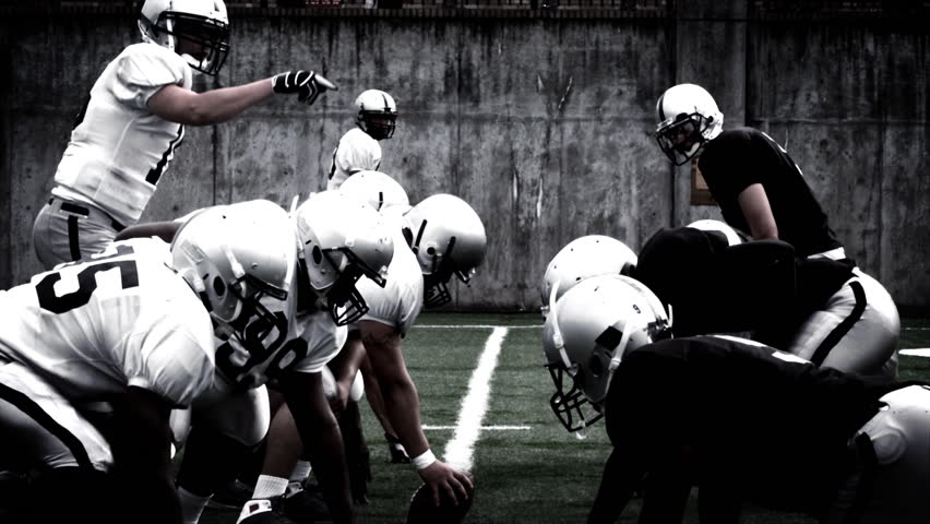 A Quarterback Hikes the Ball Stock Footage Video (100% Royalty-free ...