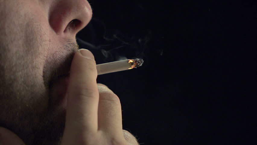 Close Up Of A Man Smoking A Cigarette. High Definition Video Shot On ...