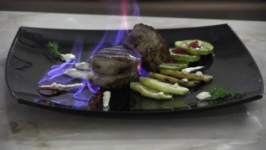 Flambe Meat On Black Plate Stock Footage Video (100% Royalty-free ...