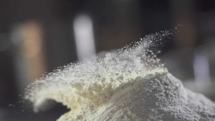 Salt Grain Crystals Falling In Slow Motion On Black Background Stock ...