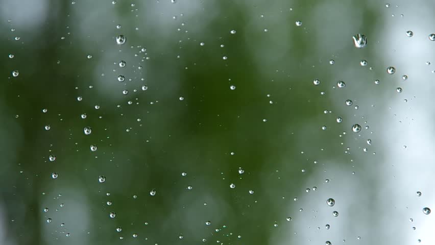 Rain And Water Drops Falling On Glass During Rain Storm, Close Up ...