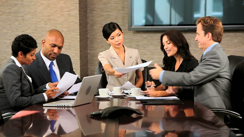 Female Caucasian Business Executive In A Boardroom Meeting With Her ...