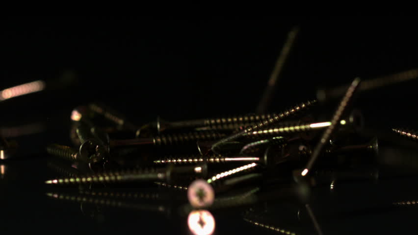 Screws Falling On Black Surface Stock Footage Video (100% Royalty-free ...