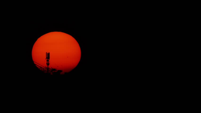 Red Sun Disk Moving Through Stock Footage Video (100% Royalty-free ...