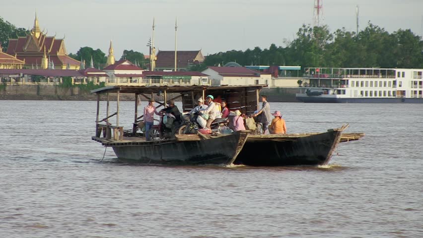 A Logging Boom Boat Is Moored Alongside A Fast Moving River/Boom Boat/A ...