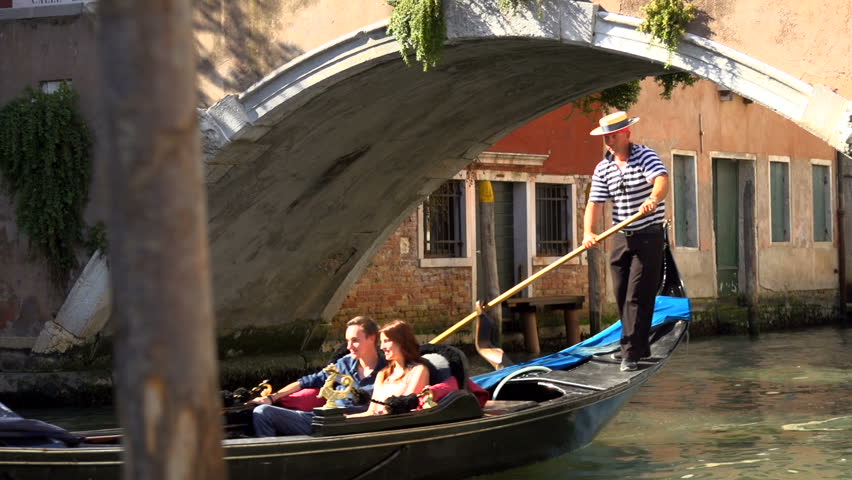 Travel Couple In Venice On Gondola Ride Enjoying Romance In Boat Happy ...