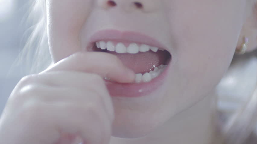 Little Girl First Falling Tooth, Stock Footage Video (100% Royalty-free ...