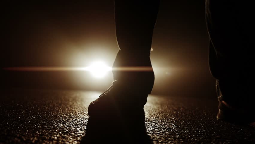 Low Angle View Of Man Feet Walking Into Dark Night. Mystical Fog ...