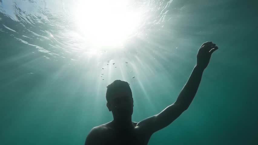 Two Young Men Jumping Into Deep Blue Sea Water Ocean Tropical Location ...