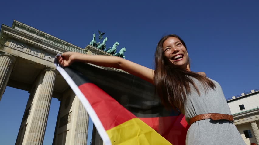 German Flag - Woman Happy At Berlin, Germany, Brandenburg Gate Cheering ...