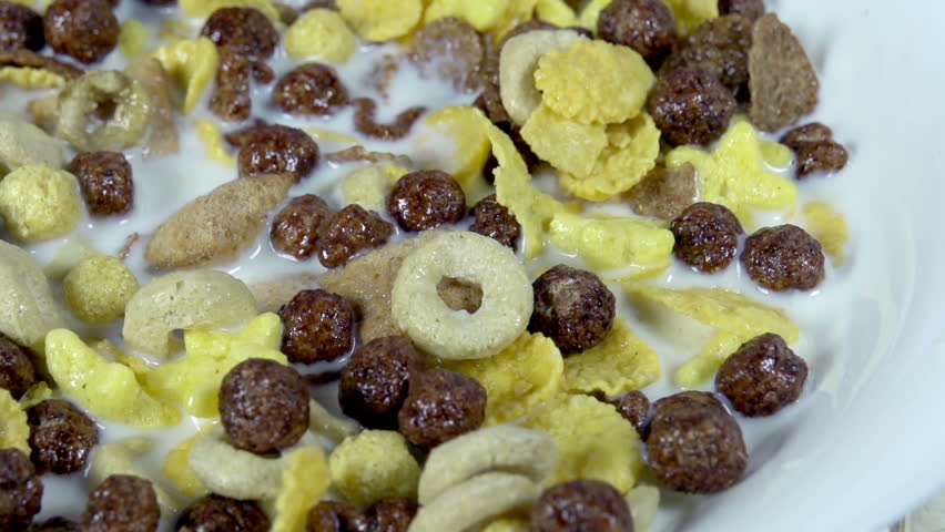 Mix of Different Cornflakes. Plate Stock Footage Video (100% Royalty ...