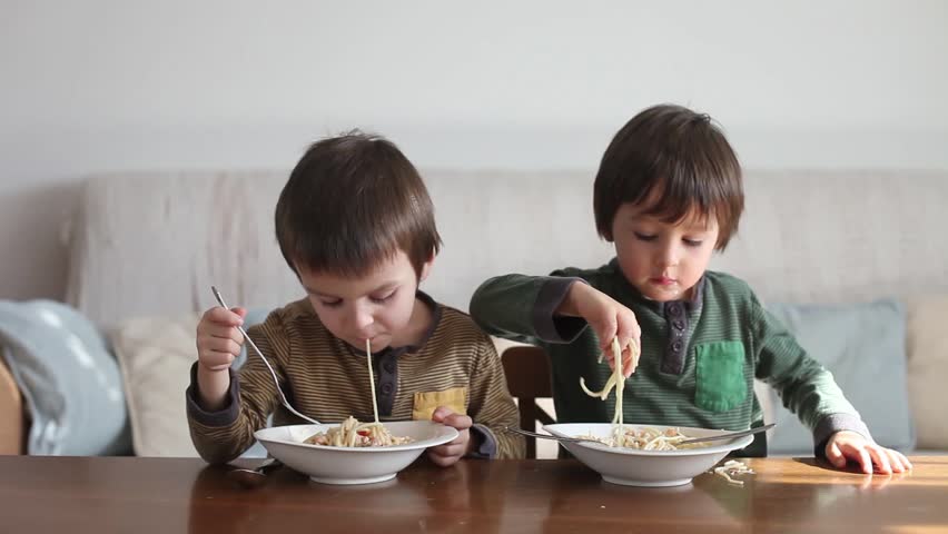 Adorable Little Kids, Eating Spaghetti At Home, Homemade Pasta Stock ...